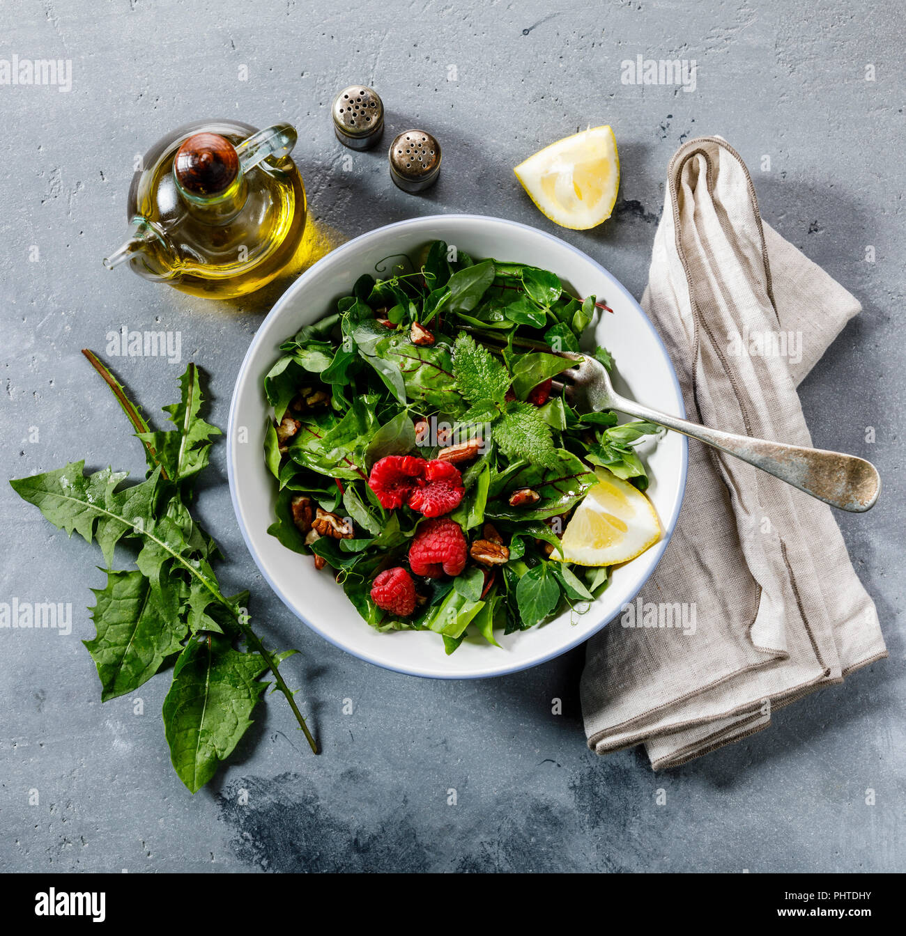 Salad from Meadow and Medicinal herbs with dandelion and nettle leaves ...