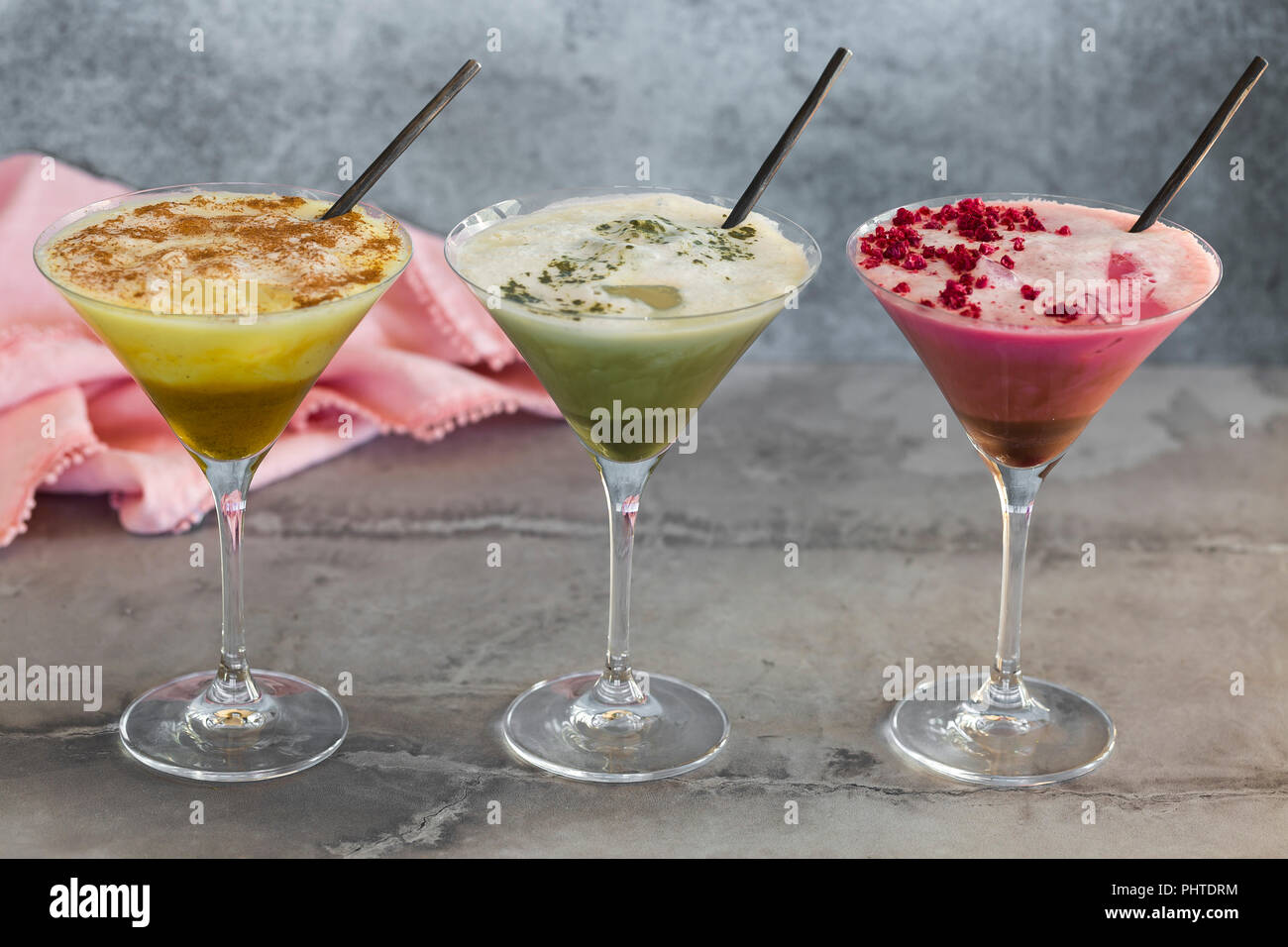 Iced Tumeric, Matcha and Beetroot Lattes Stock Photo - Alamy