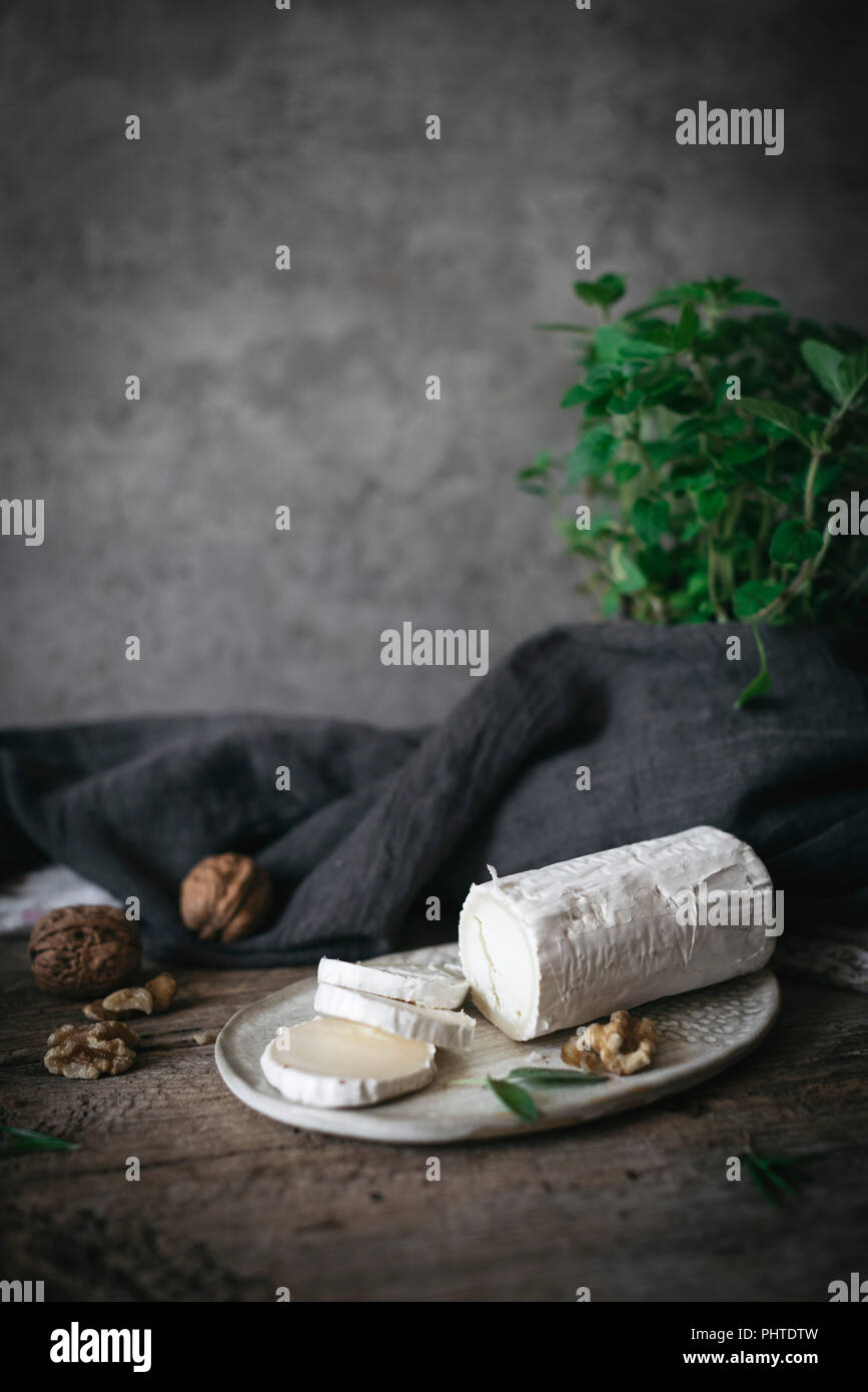 Sliced Goats cheese Stock Photo - Alamy
