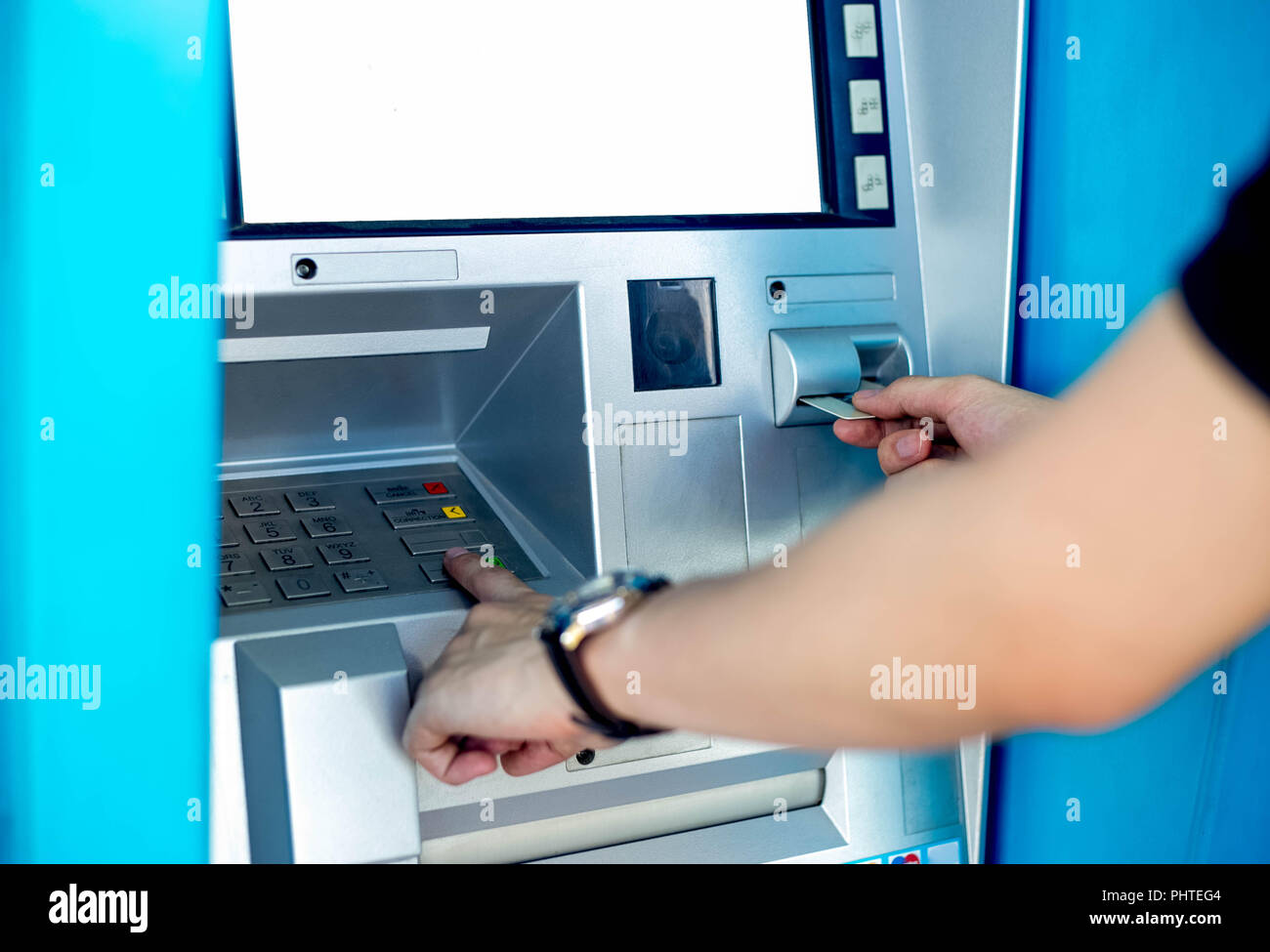 Mans hand using key hi-res stock photography and images - Alamy