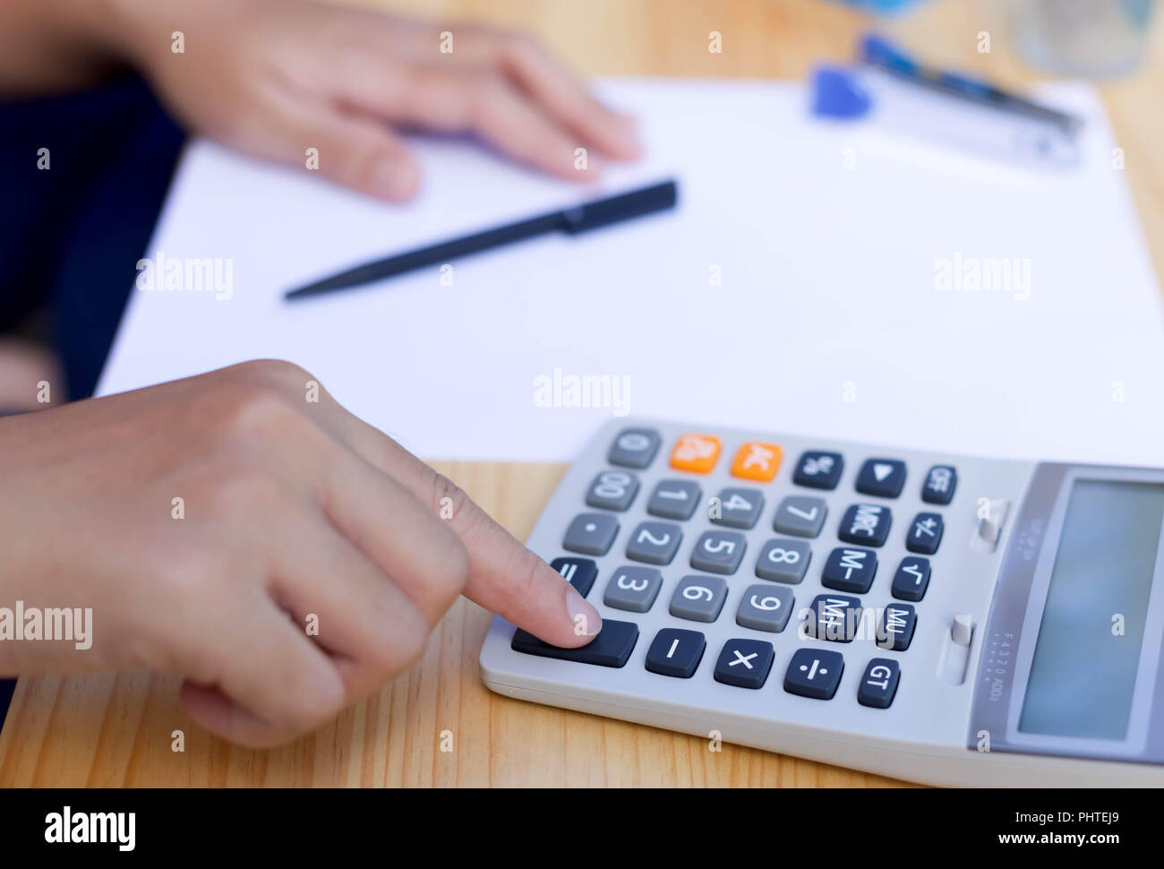 Calculating figures hi-res stock photography and images - Alamy