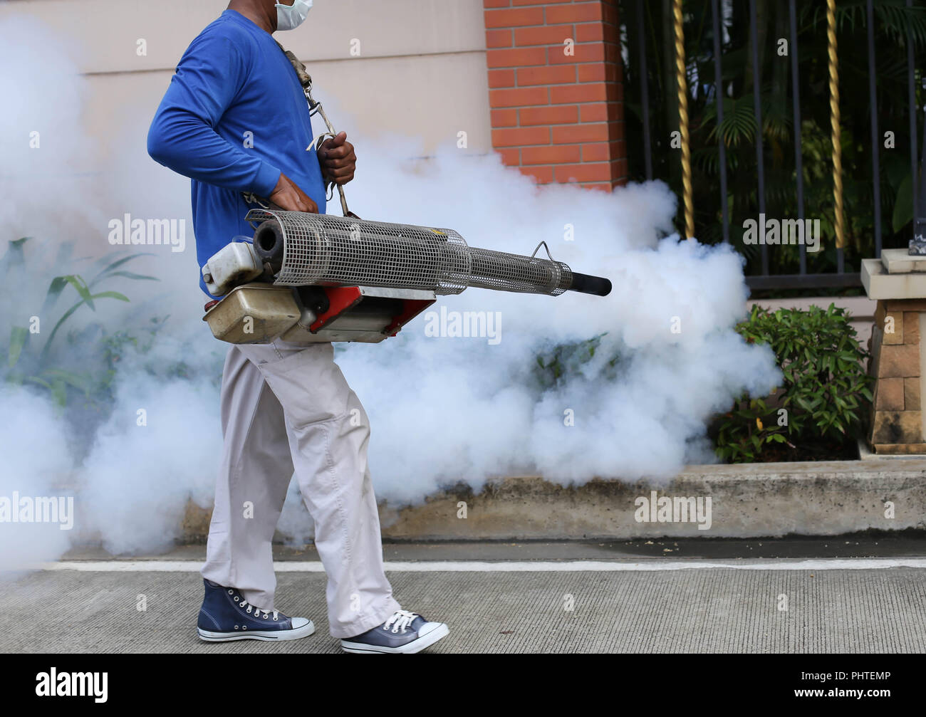 Fogging mosquito to prevent of dengue fever Stock Photo - Alamy