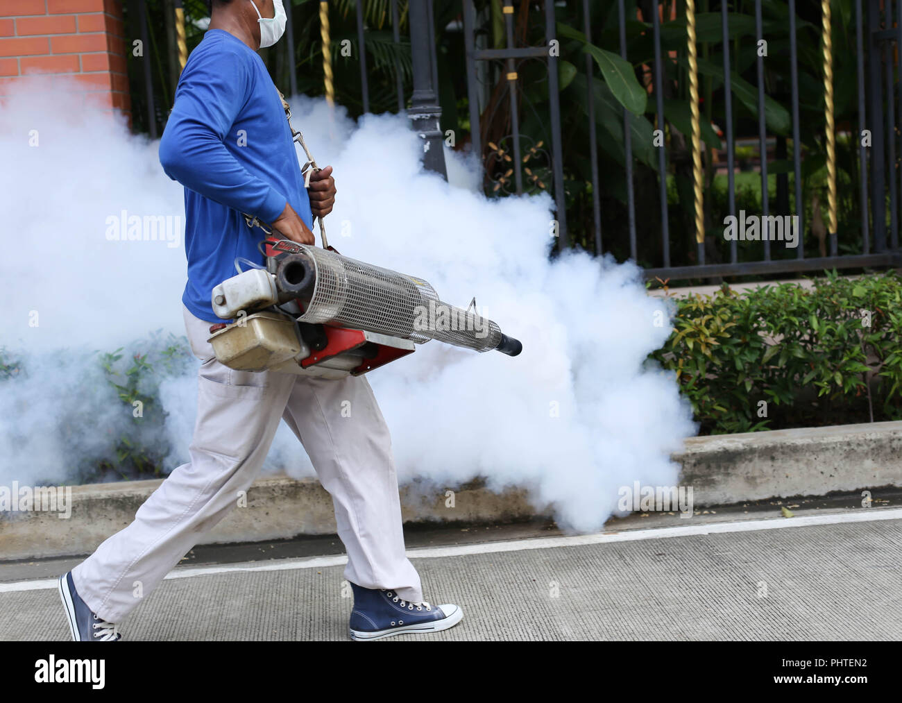 Fogging mosquito to prevent of dengue fever Stock Photo - Alamy