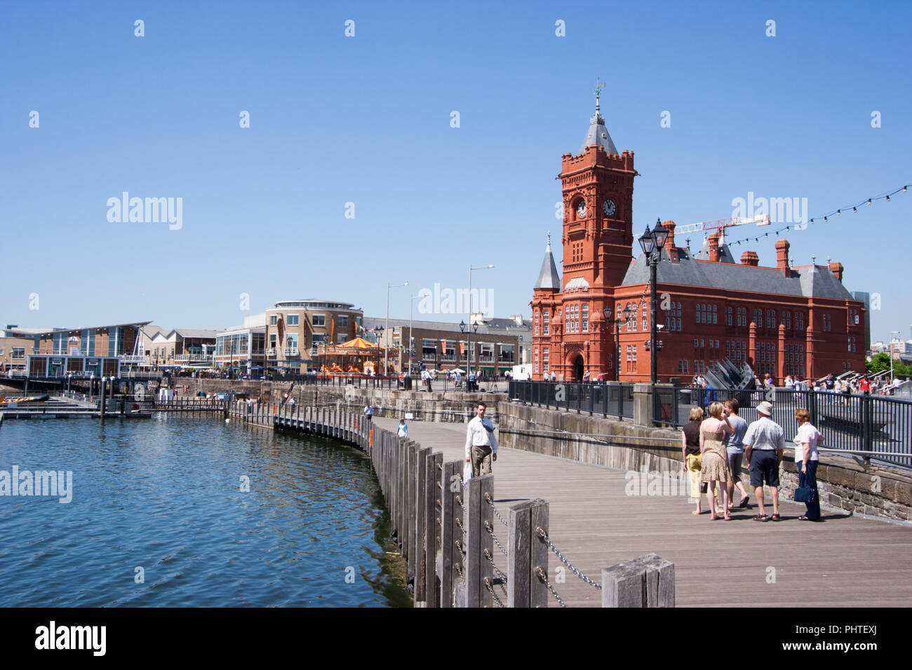 Cardiff Bay, South Wales, UK. Sunny weather along the waterfront, with ...
