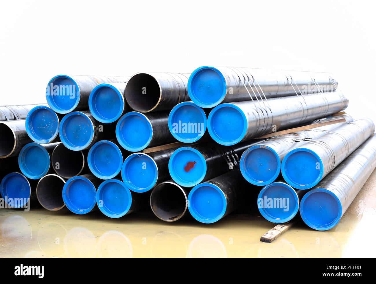 Stacks of black water pipes Stock Photo - Alamy