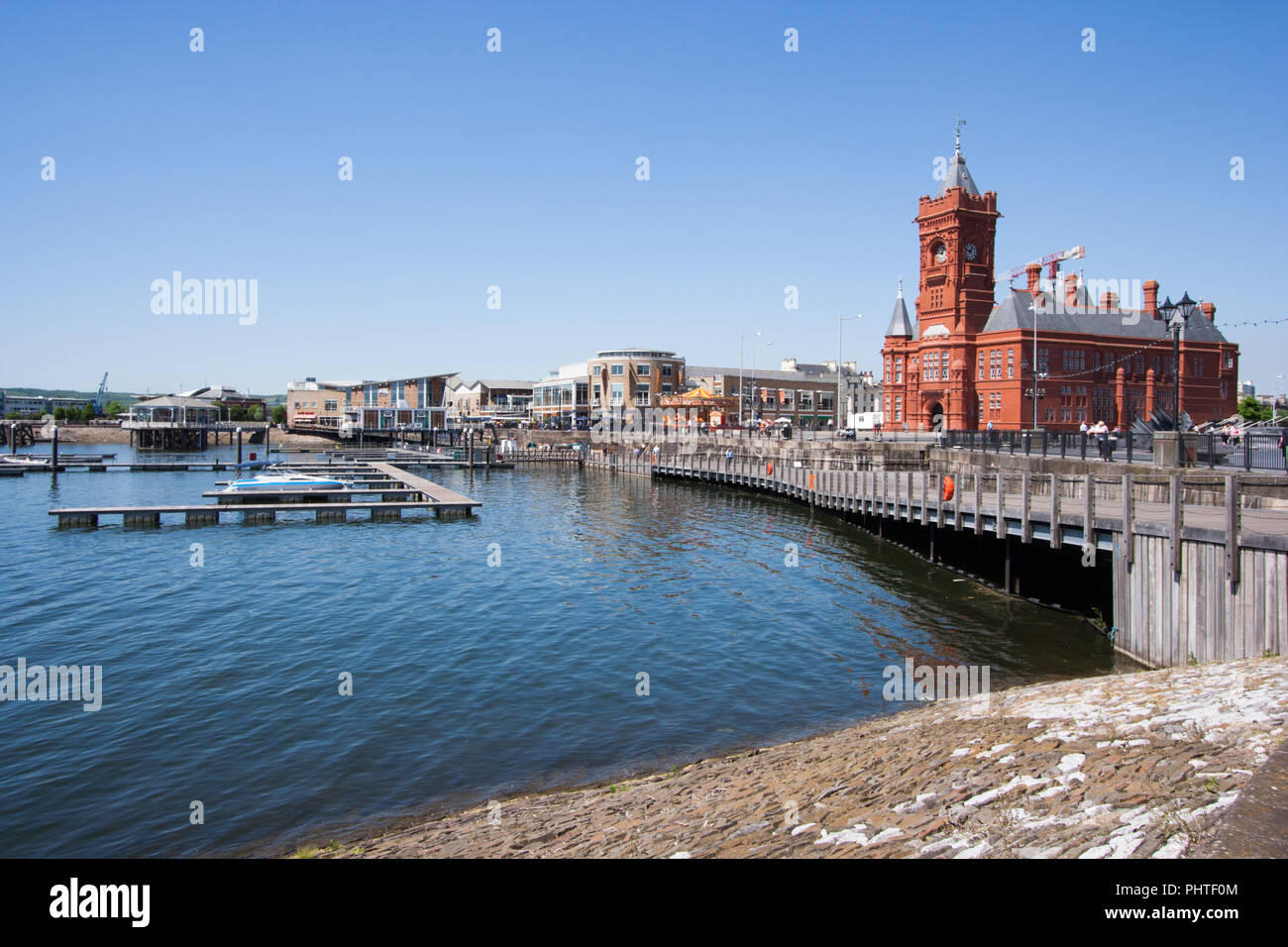 Cardiff Bay, South Wales, UK. Sunny weather along the waterfront, with ...