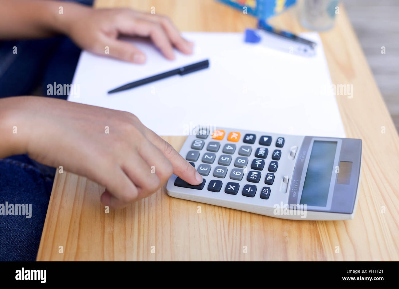 Calculating figures hi-res stock photography and images - Alamy