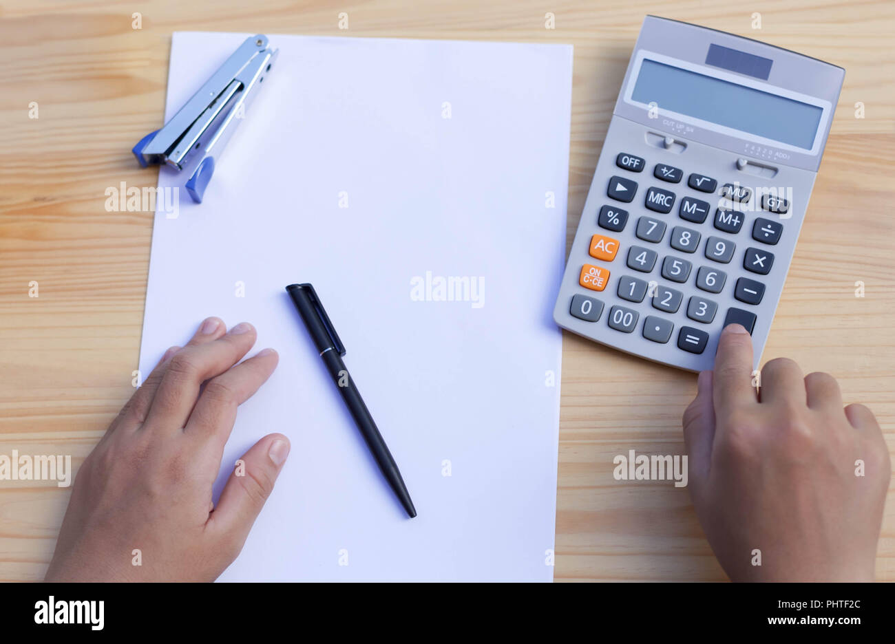 Calculating figures hi-res stock photography and images - Alamy