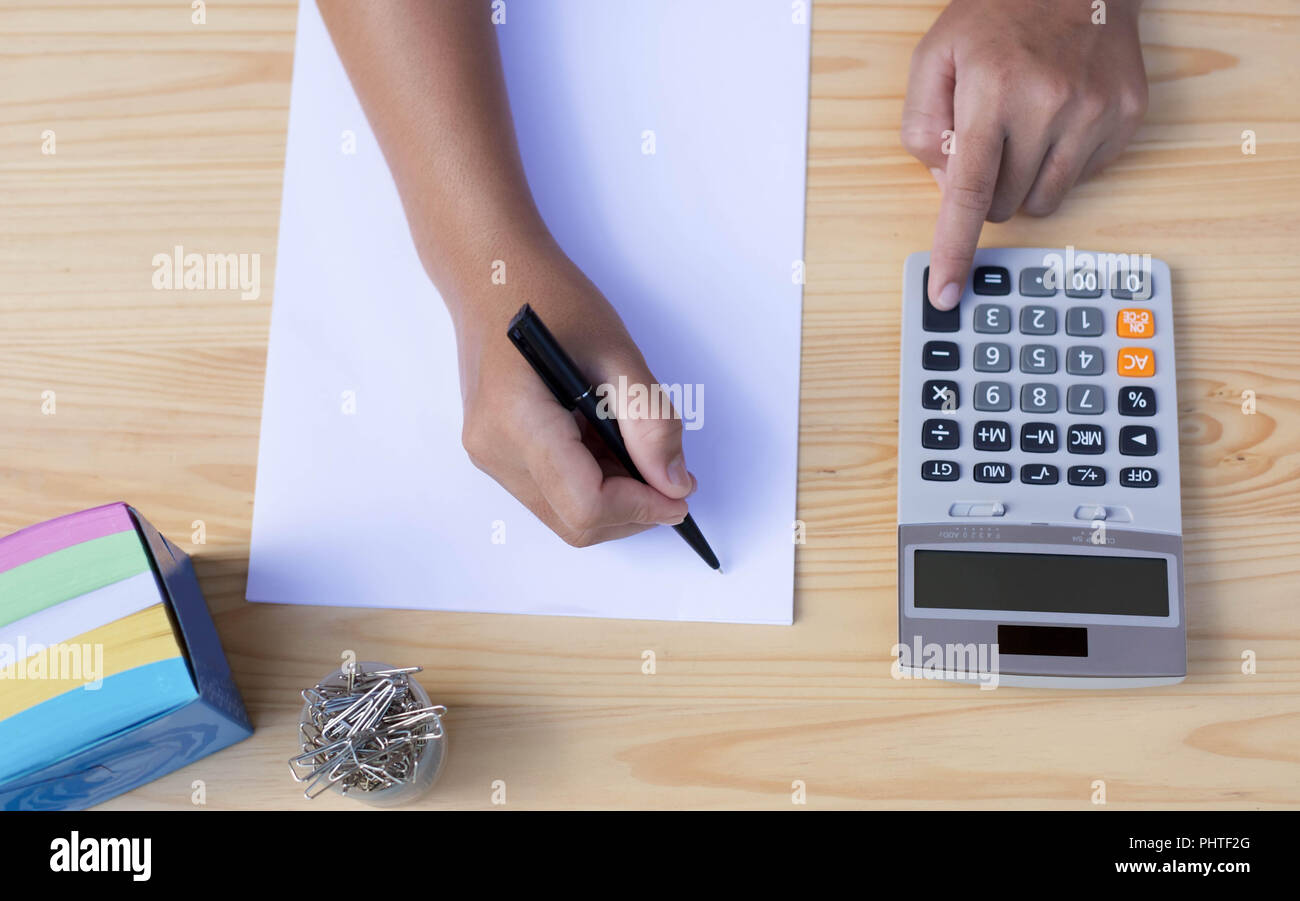 Calculating figures hi-res stock photography and images - Alamy