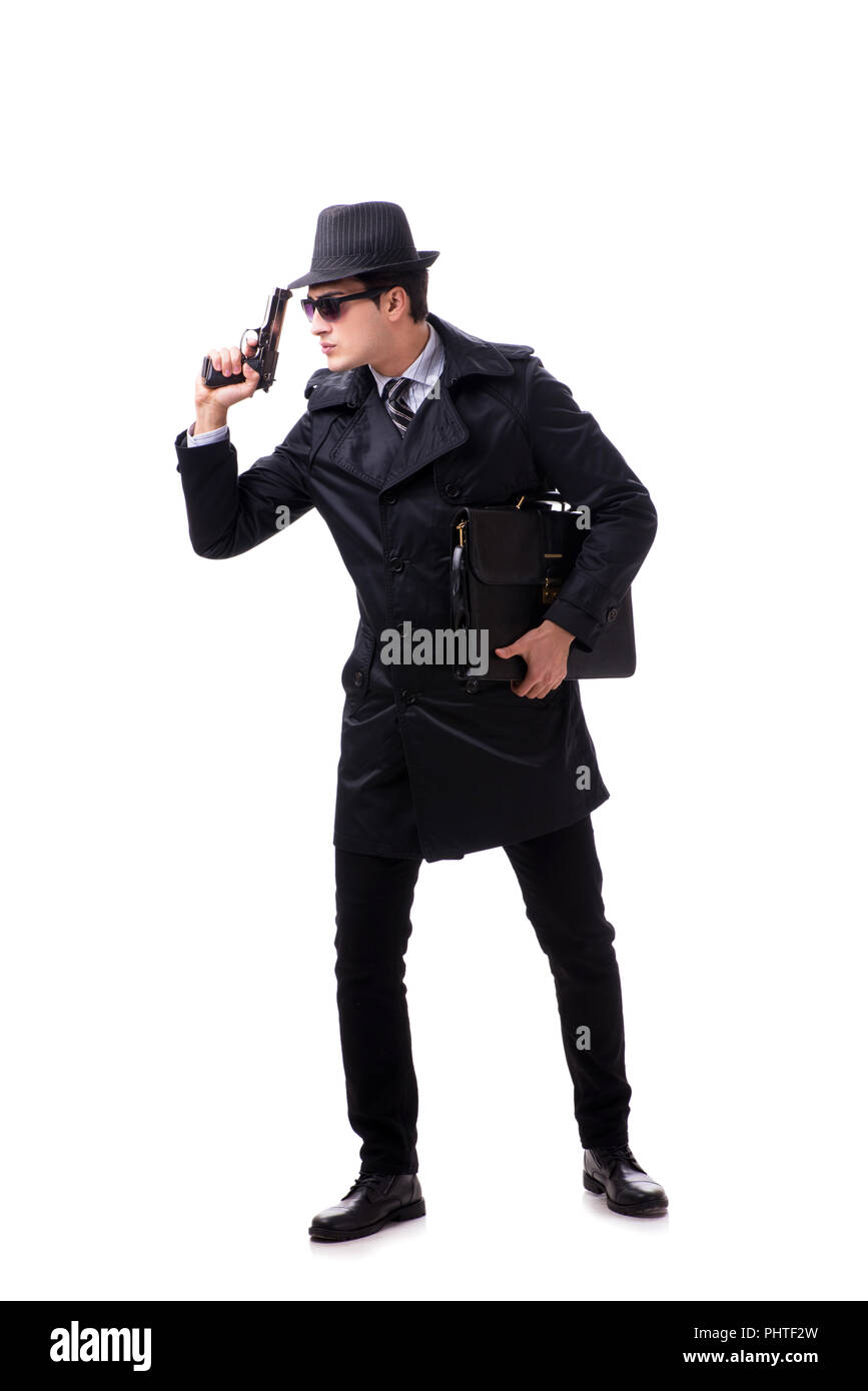 Man spy with handgun isolated on white background Stock Photo - Alamy