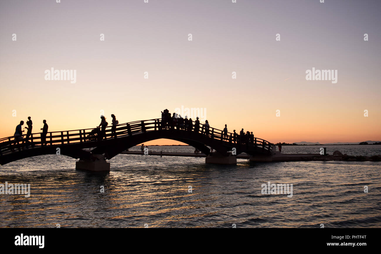Bridge and people - People walking along a bridge, in a beautiful ...