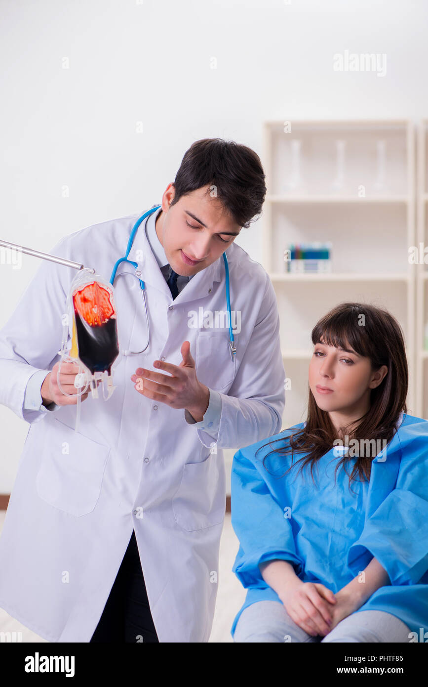Doctor discussing blood transfusion with patient Stock Photo - Alamy
