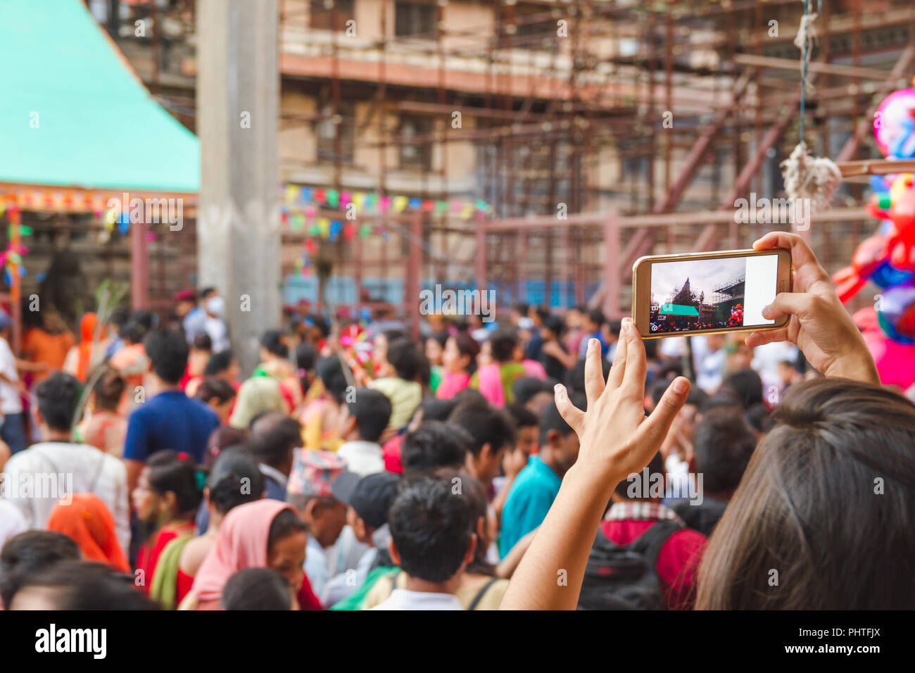 People taking Photos with Smartphone at the Festival in Kathmandu Nepal ...