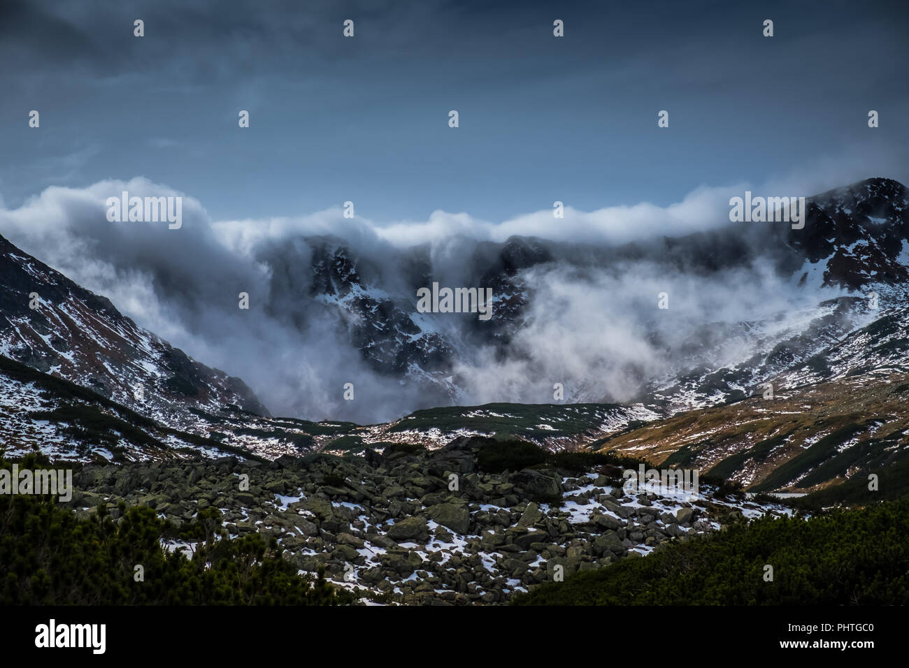Clouds spilling hi-res stock photography and images - Alamy