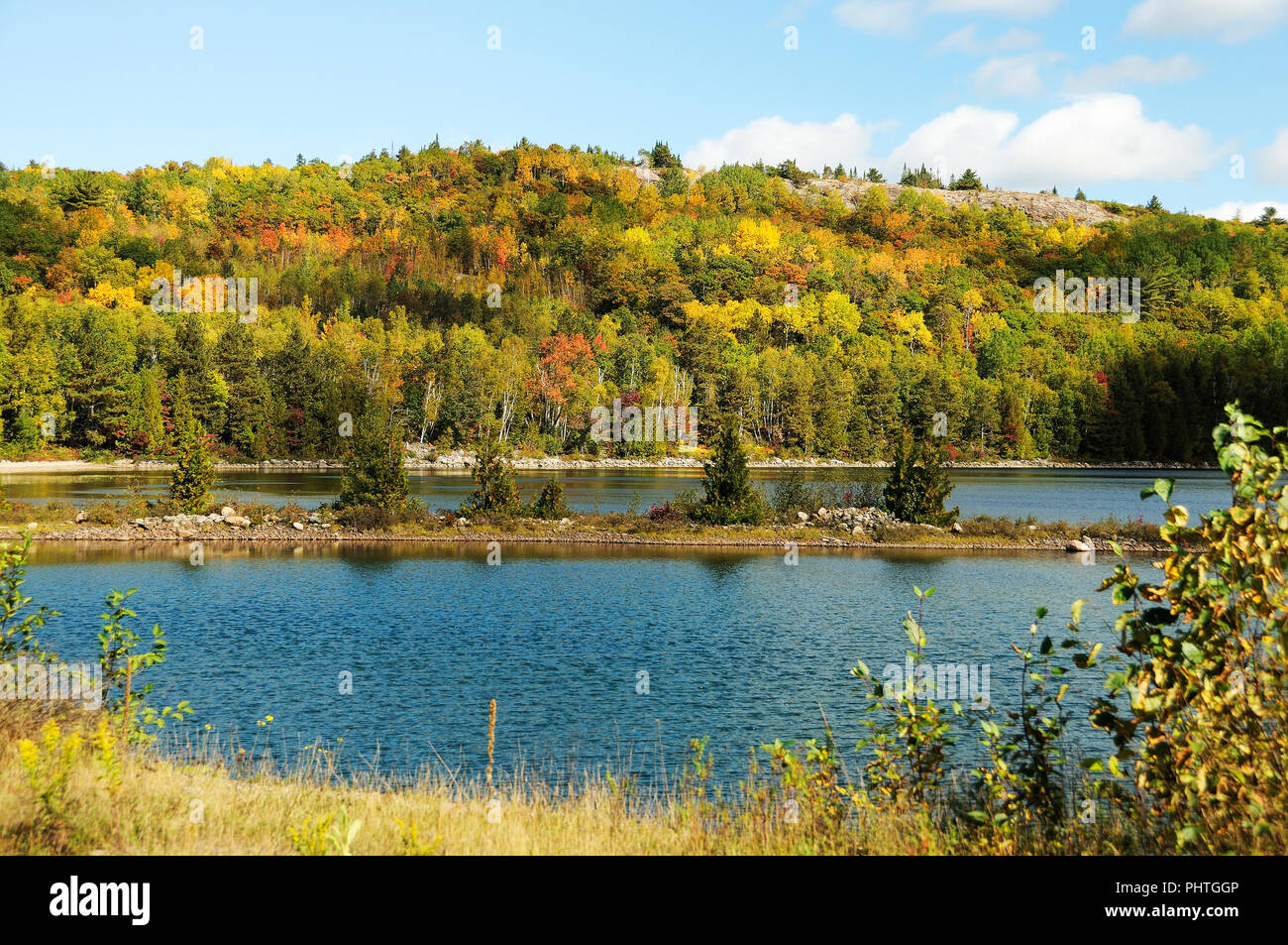 Autumn scenery landscape showing colorful nature scene with river, sky ...