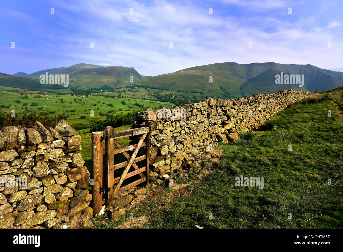 Timber gate in the dry stone wall Stock Photo - Alamy