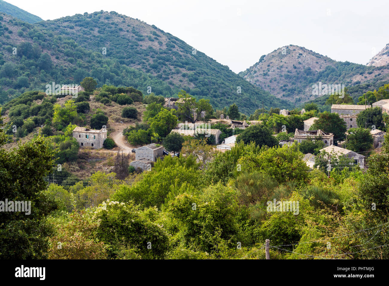 Old abandoned stone-built houses in Old Perithia at Pantokrator ...