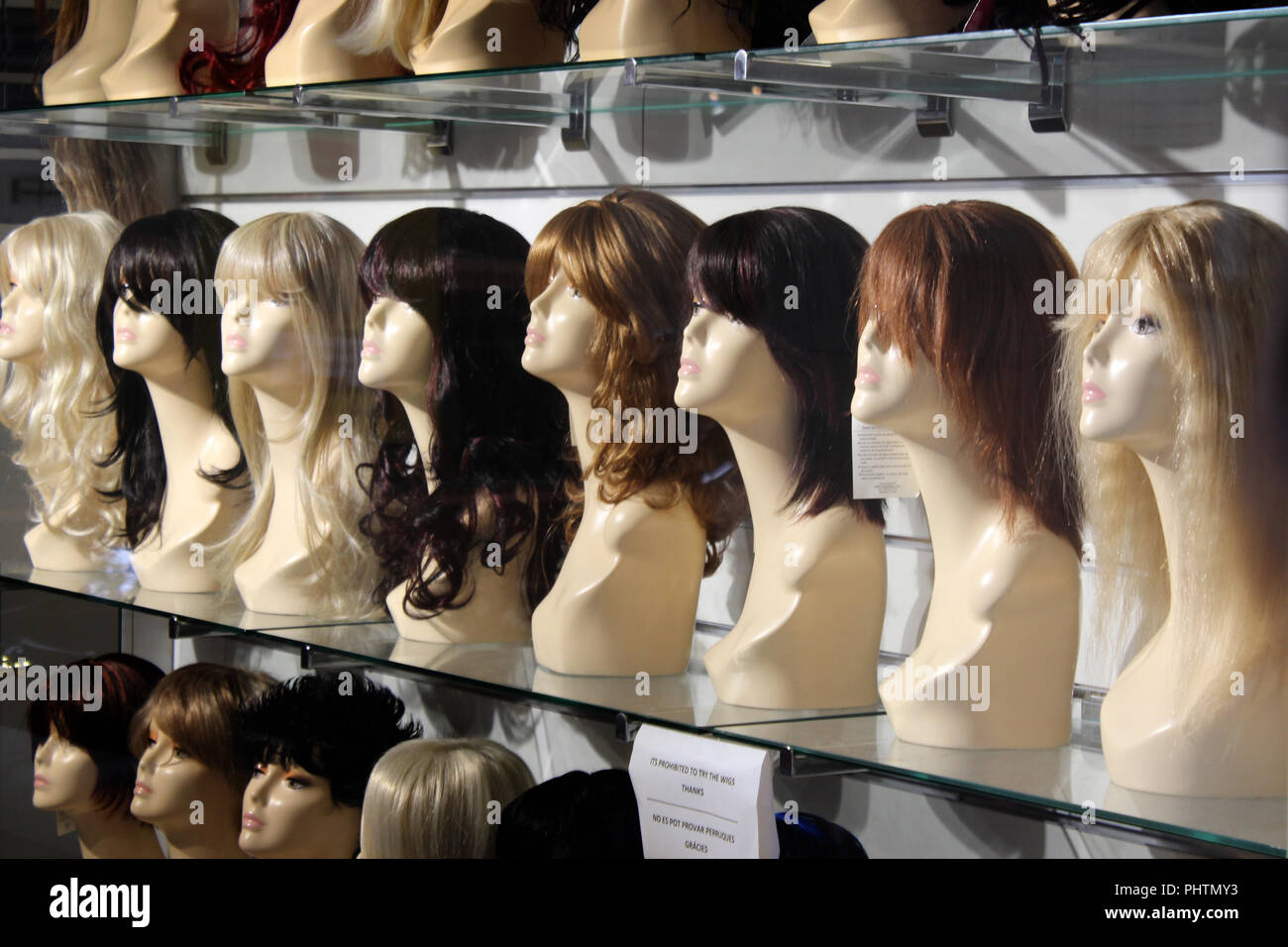 Wig shop window display hair hi-res stock photography and images - Alamy