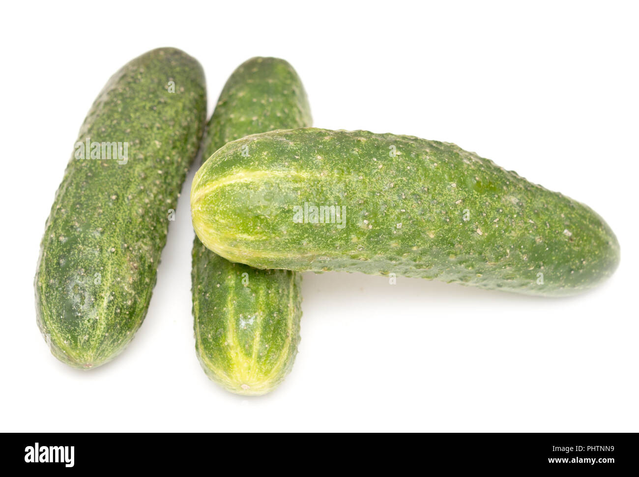 Cucumbers on white Stock Photo - Alamy