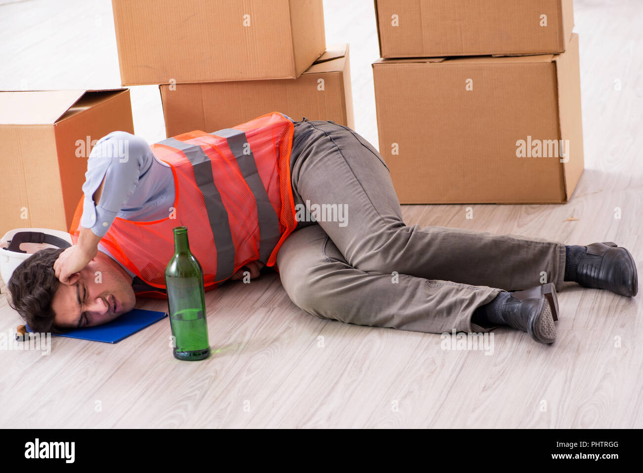 Delivery man drunk at work Stock Photo - Alamy