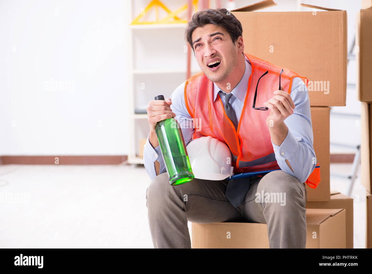 Delivery man drunk at work Stock Photo - Alamy