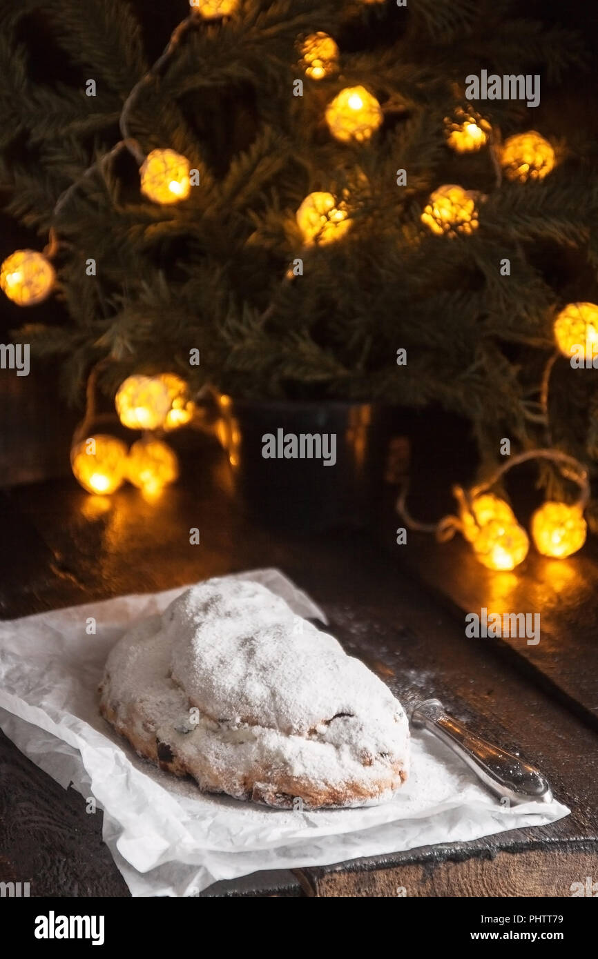 Dresden Stollen is a Traditional German Cake with raisins on a light ...
