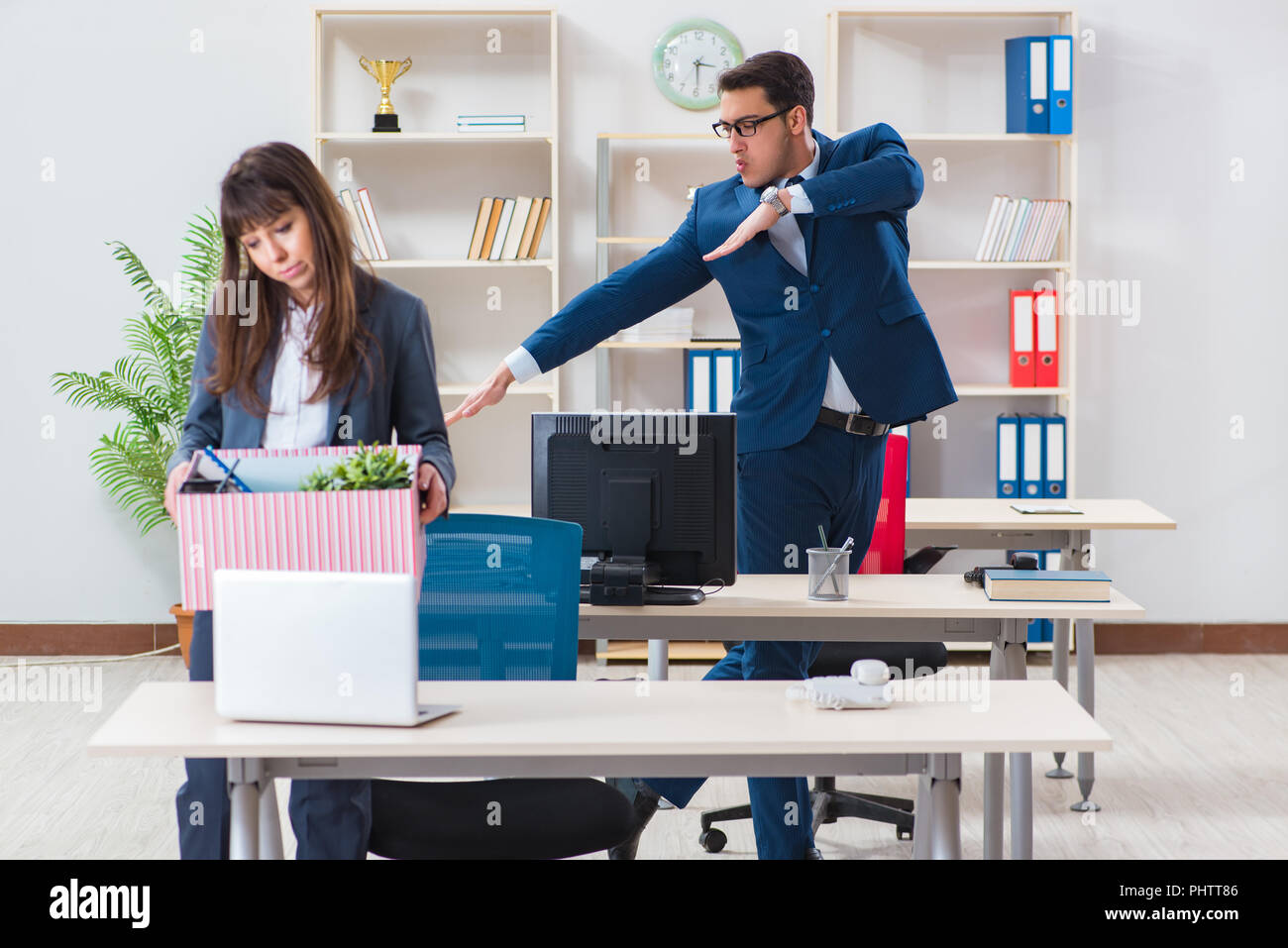 Person being fired from his work Stock Photo - Alamy