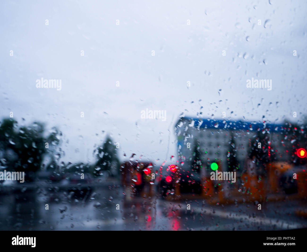 Water drop on the glass of windows background, raining on the glass off ...