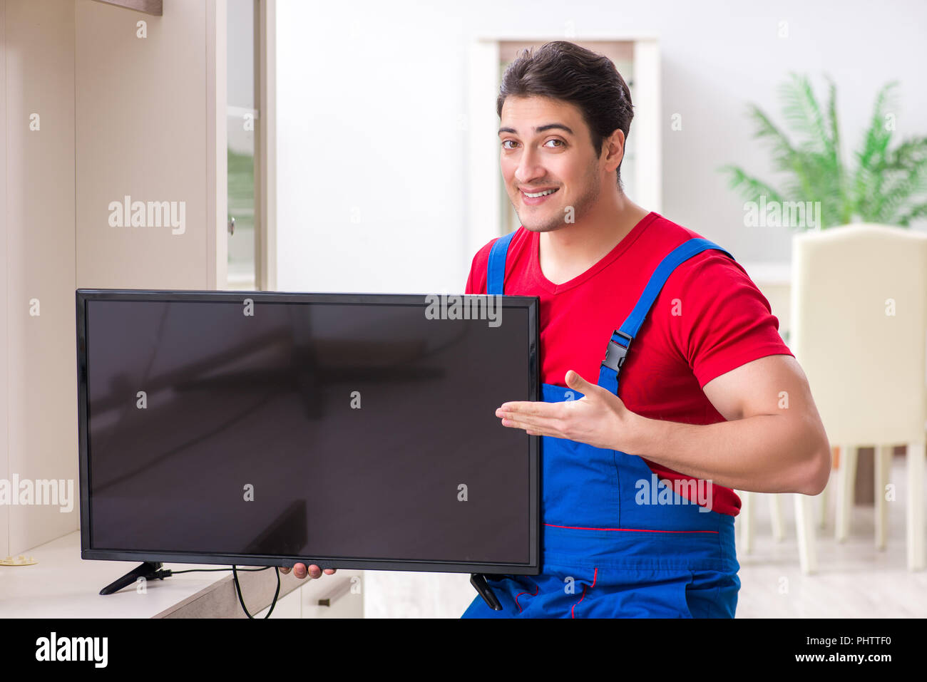 Electrician demonstrating his hi-res stock photography and images - Alamy