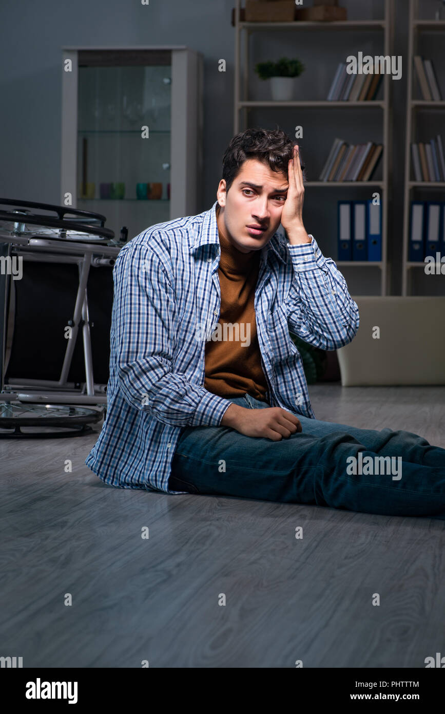 Man falling off chair hi-res stock photography and images - Alamy