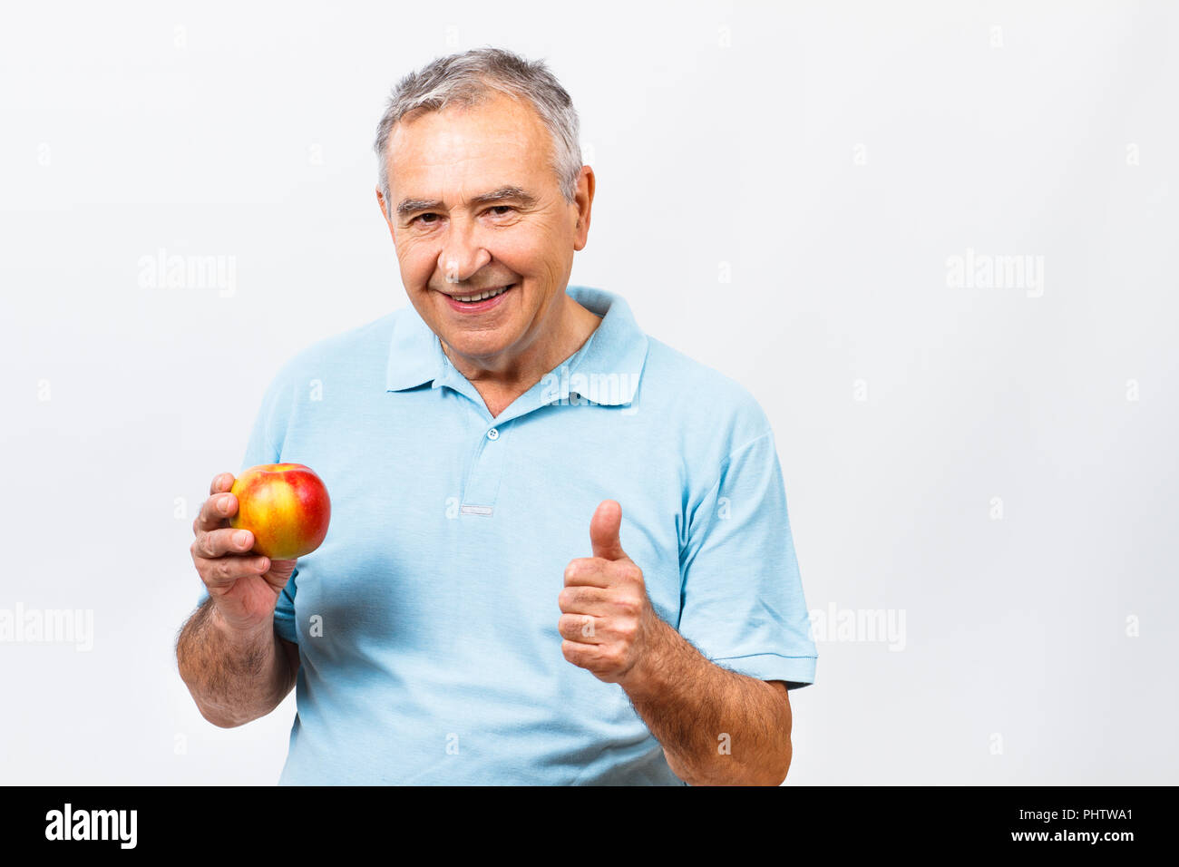 Thumbs up for healthy snack Stock Photo - Alamy