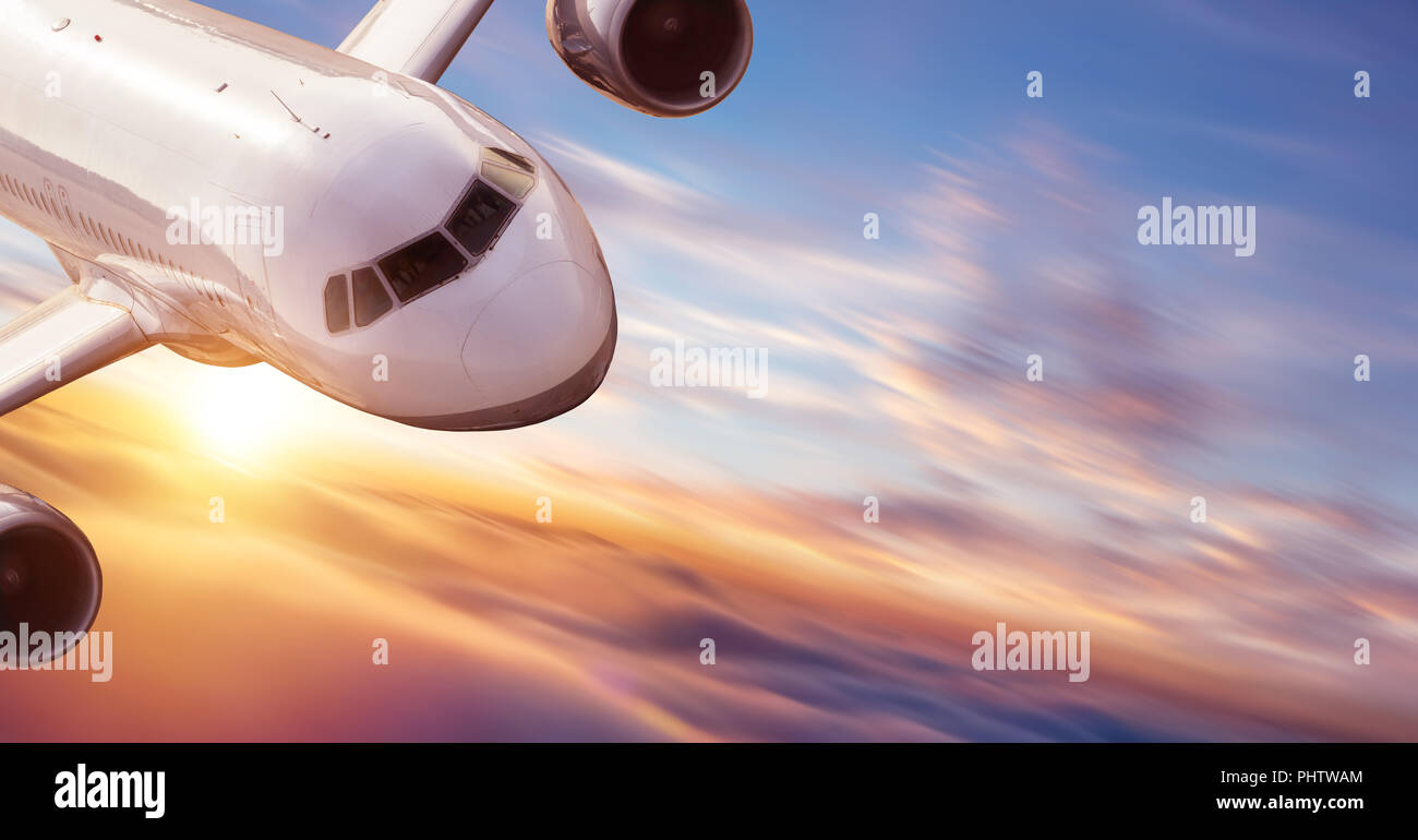 Close-up of commercial jetliner flying at high speed. Concept of modern ...