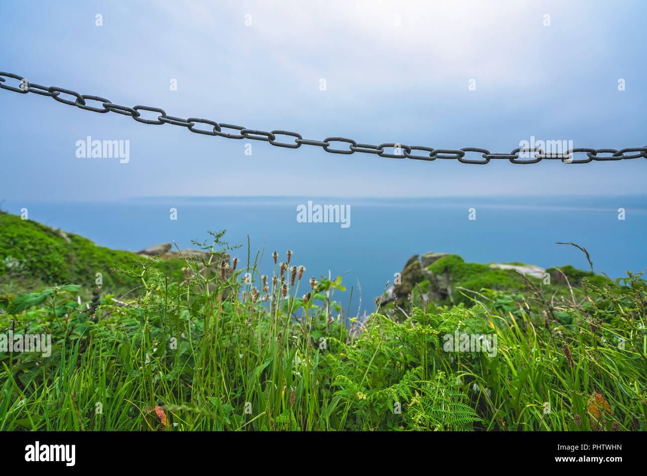 Metal fence over ocean hi-res stock photography and images - Alamy