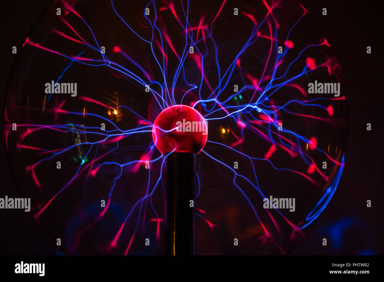 Electric plasma in glass sphere Stock Photo - Alamy