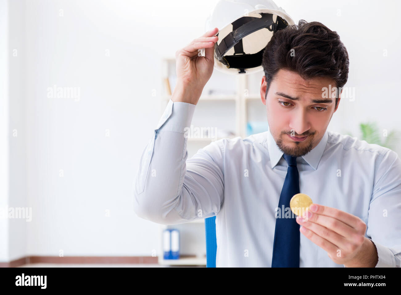 Man in bitcoin mining business concept Stock Photo - Alamy