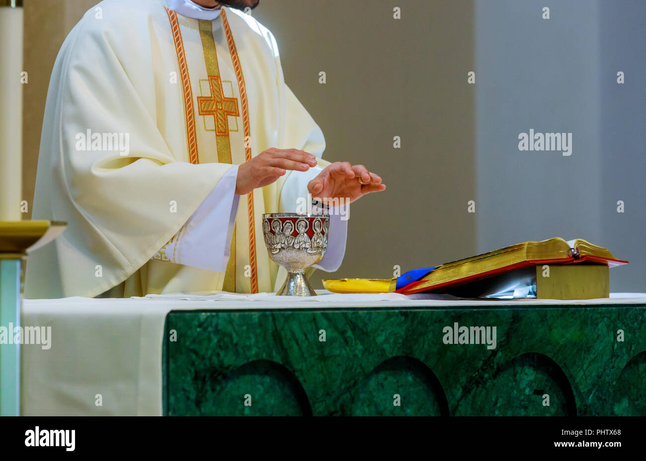 Taking communion hi-res stock photography and images - Alamy