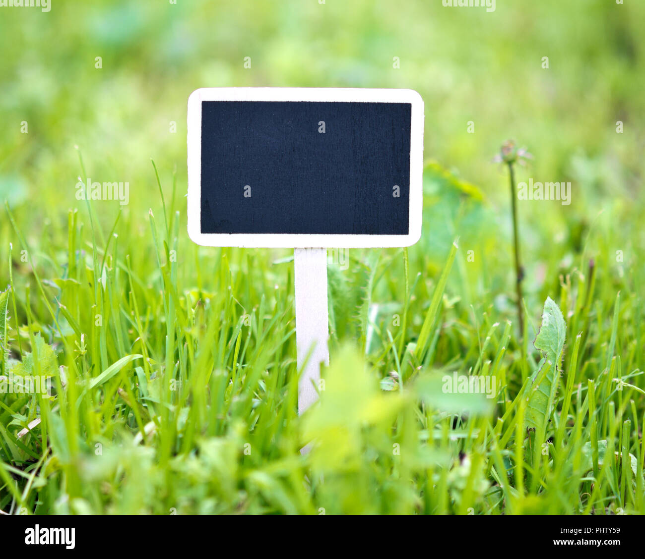 Sign on grass Stock Photo - Alamy