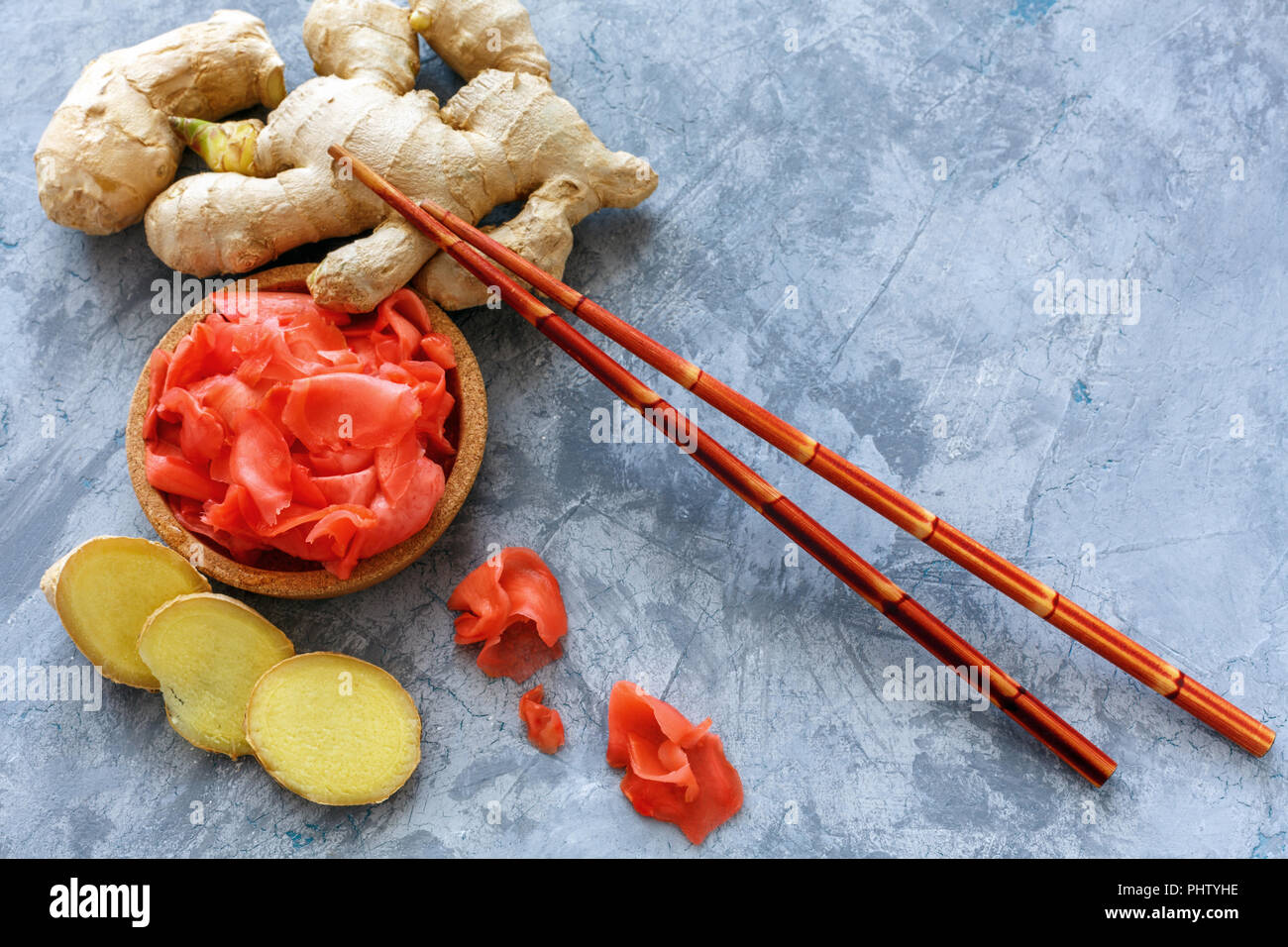 Fresh root, slices of pickled ginger and chopsticks Stock Photo - Alamy