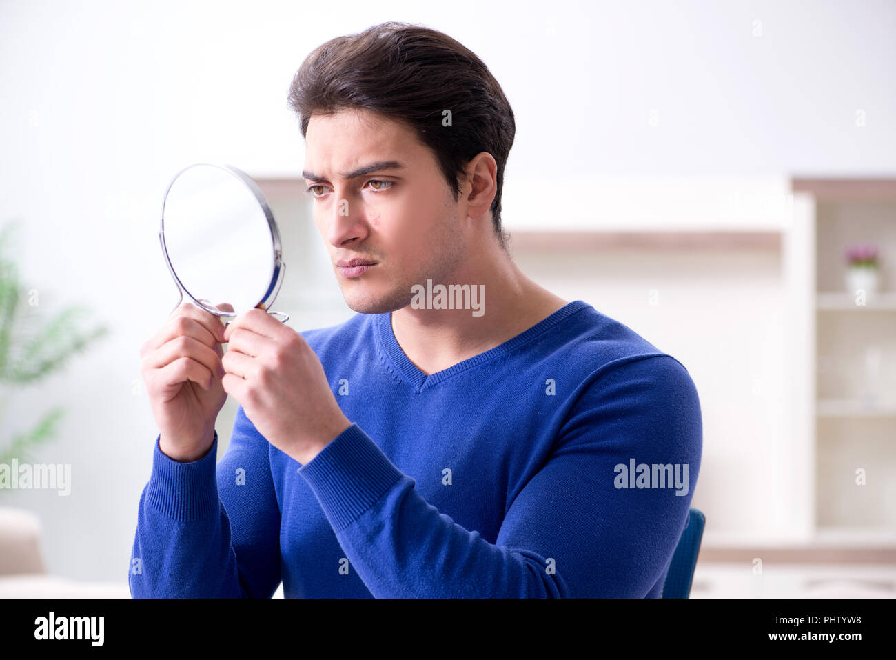 Man panicking because of pimples on the skin Stock Photo - Alamy