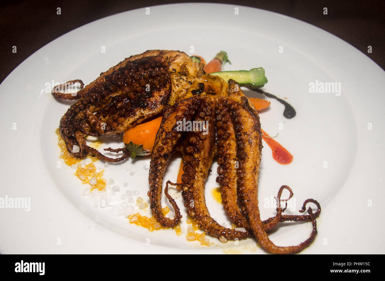 Seafood at an expensive restaurant: Grilled Octopus Stock Photo - Alamy
