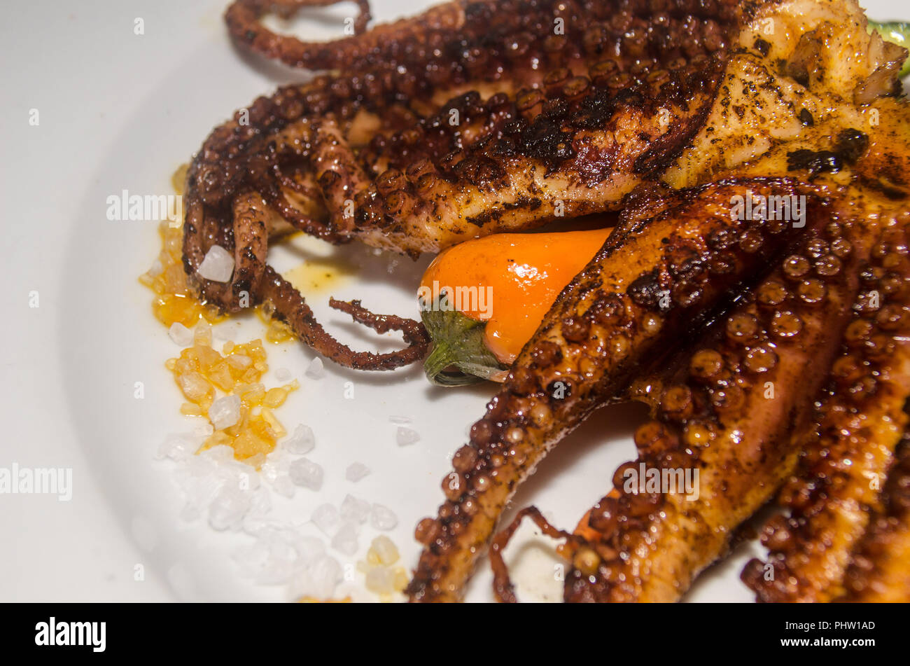 Seafood at an expensive restaurant: Grilled Octopus Stock Photo - Alamy