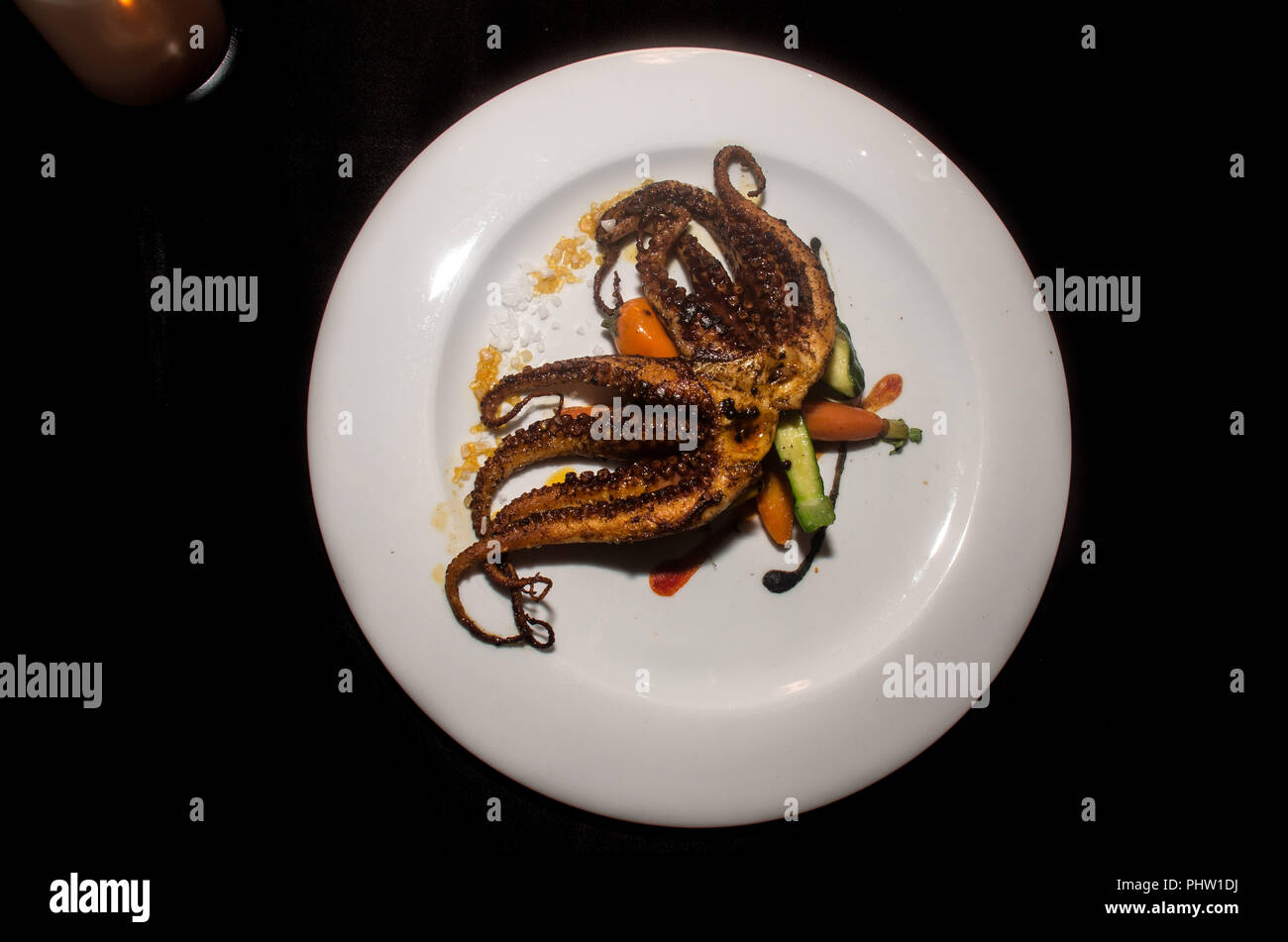 Seafood at an expensive restaurant: Grilled Octopus Stock Photo - Alamy
