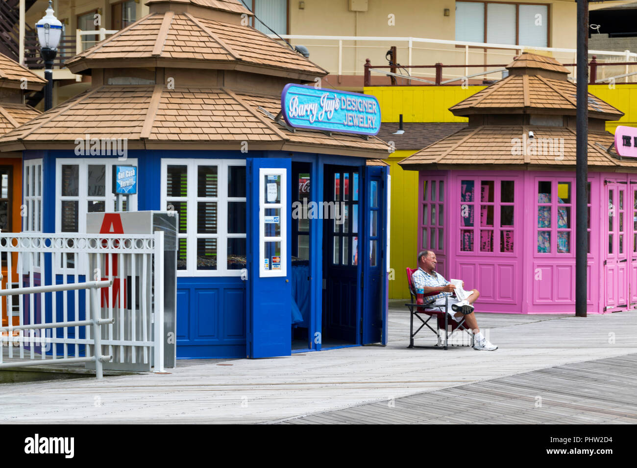 Colorful street vendor booths at the boardwalk Stock Photo - Alamy