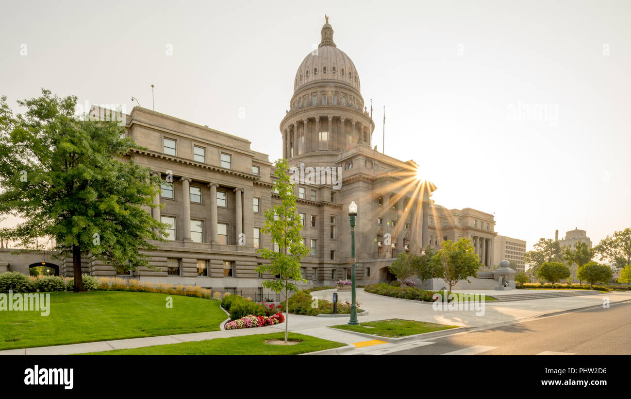 Sun star peaks arounf the capital building in Boise Idaho Stock Photo ...