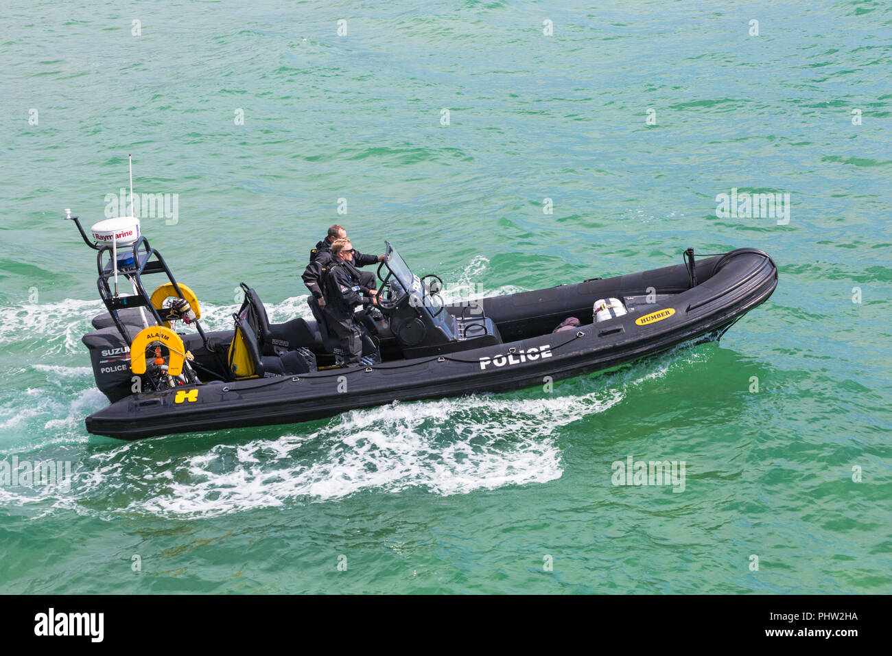 police on patrol on the sea at Bournemouth, Dorset UK in September ...