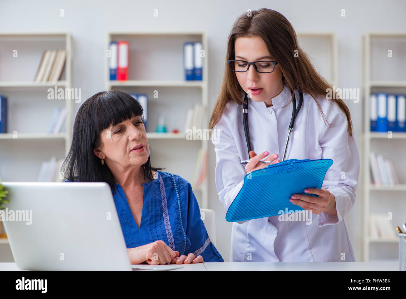 Doctor discussing test results senior hi-res stock photography and ...