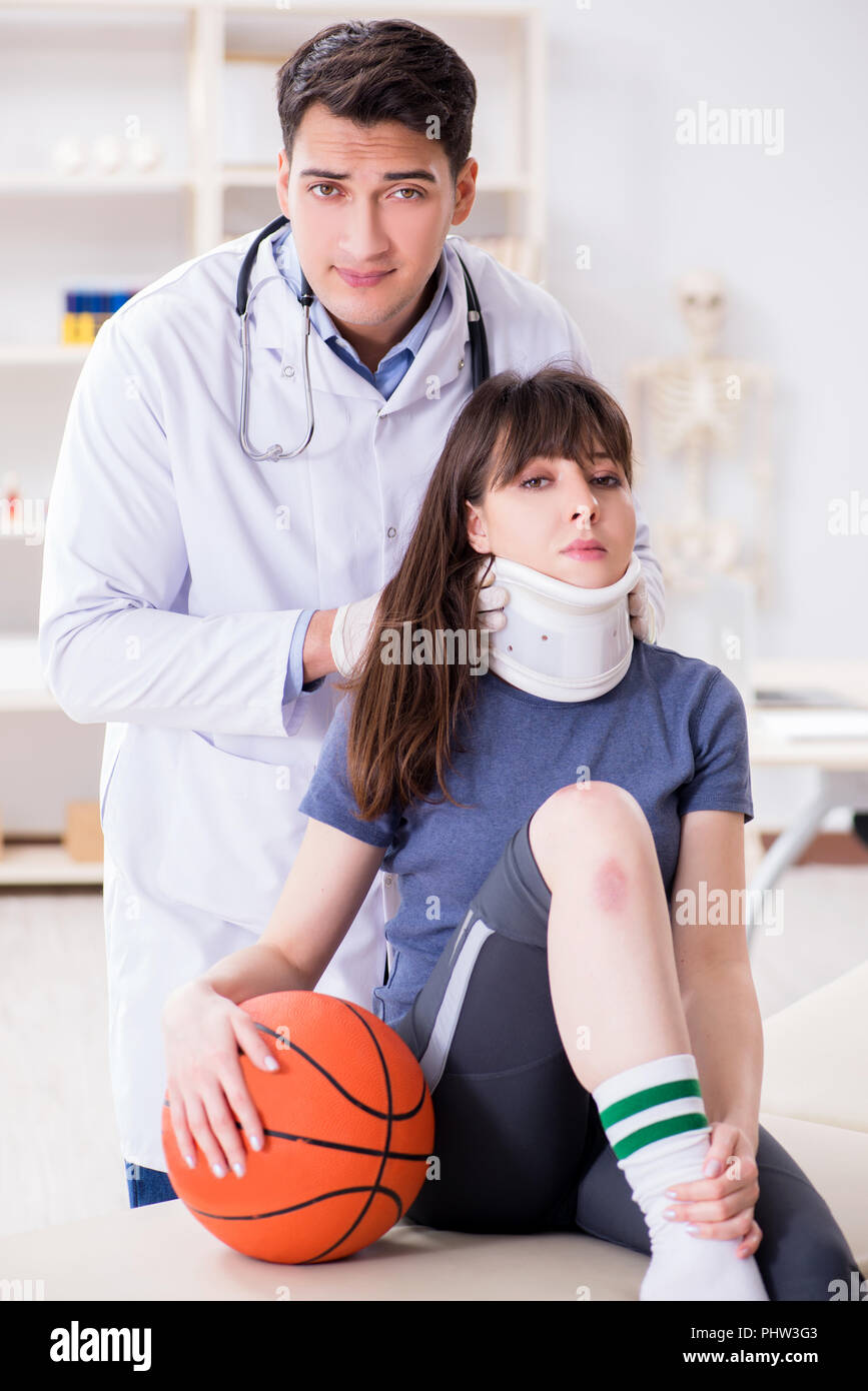 Female basketball player visiting doctor after injury Stock Photo - Alamy