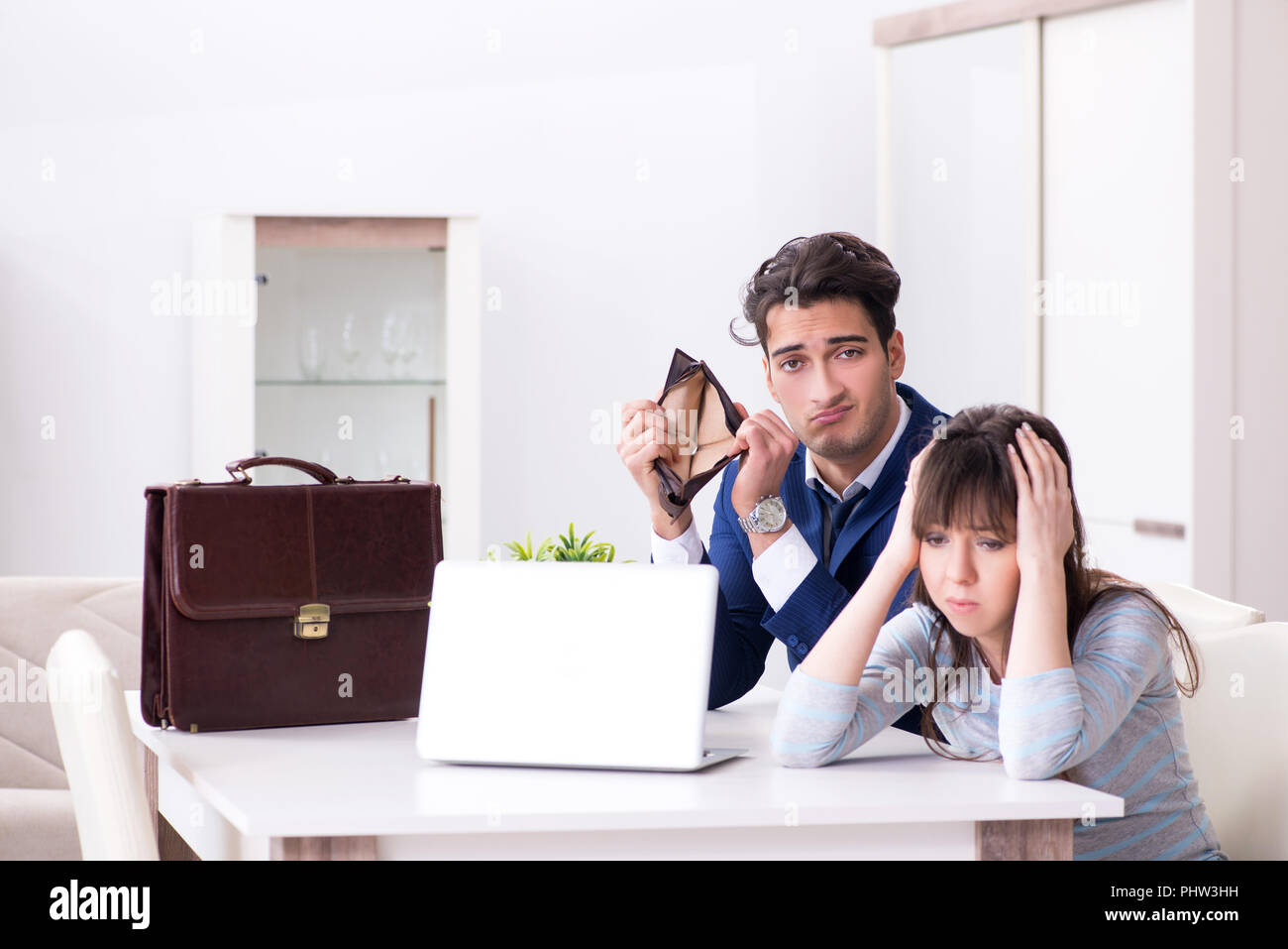 Bankrupt family with no cash at home Stock Photo - Alamy