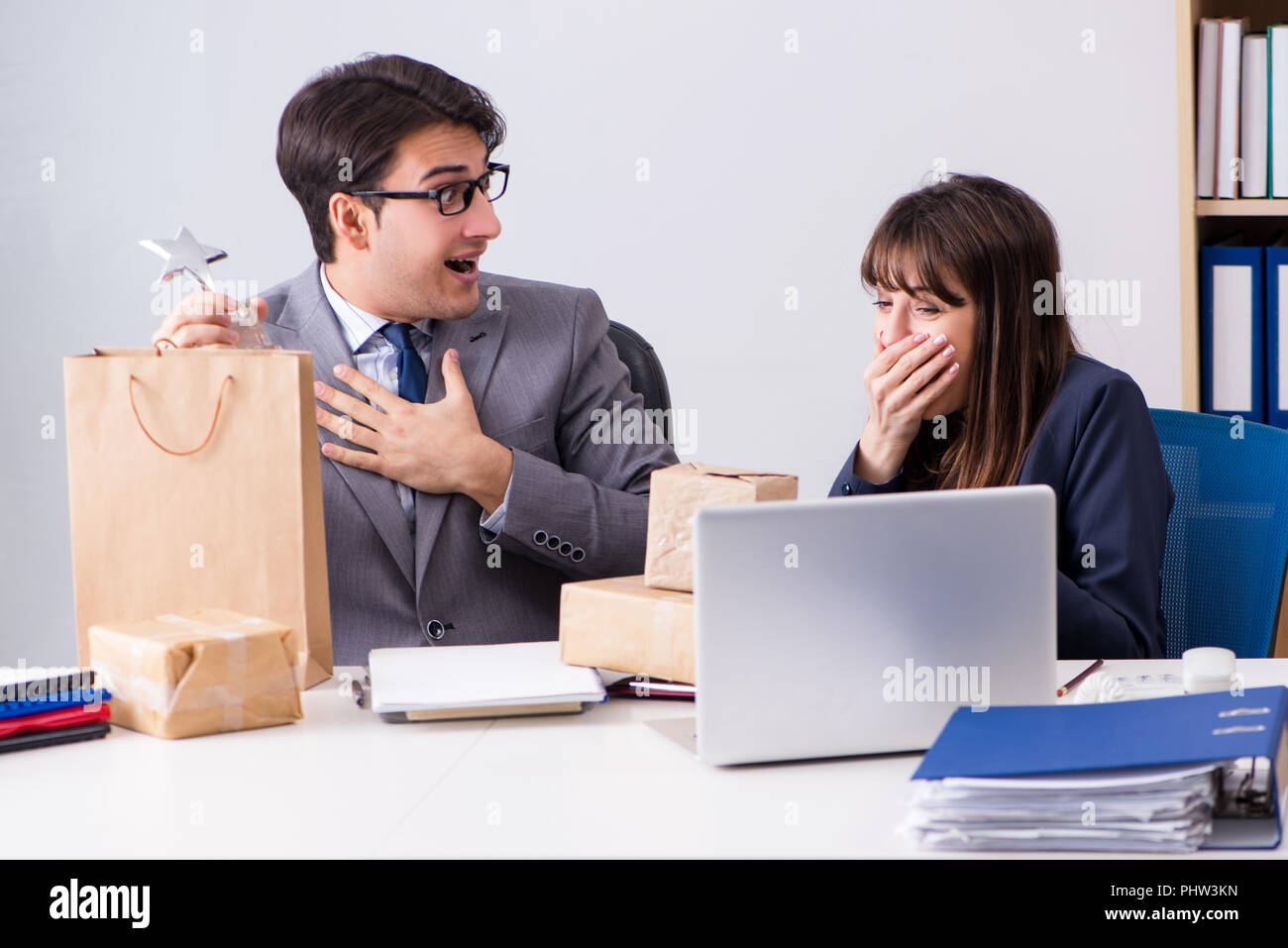 Business people receiving new mail and parcels Stock Photo - Alamy