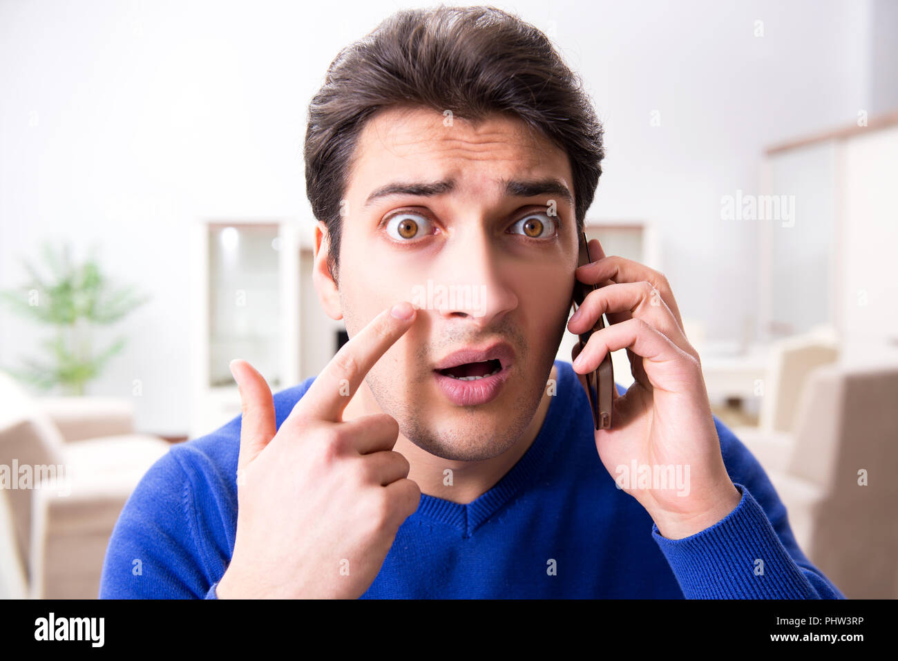 Man panicking because of pimples on the skin Stock Photo - Alamy